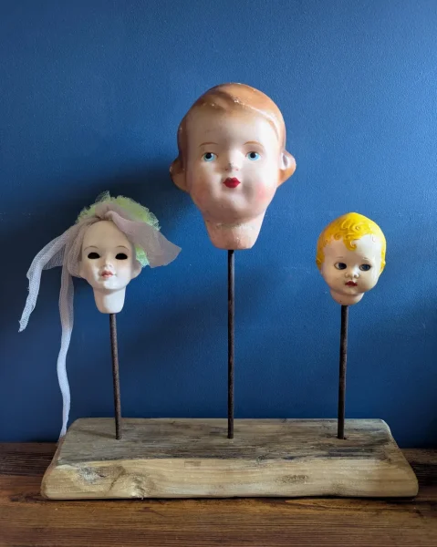 Set of three vintage dolls heads mounted on stand | Oaky Doke Vintage Home