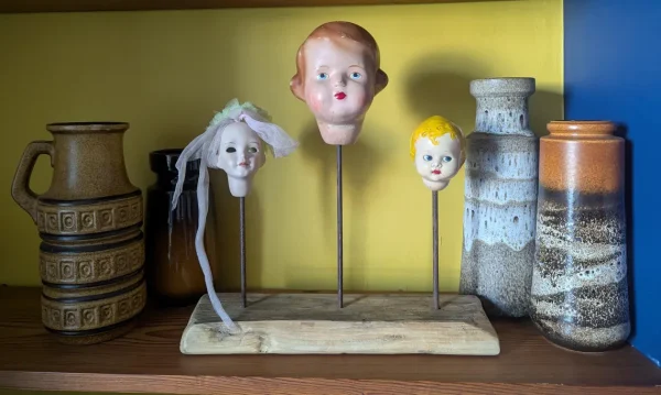 Set of three vintage dolls heads mounted on stand | Oaky Doke Vintage Home