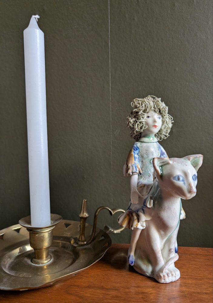 Porcelain figurine of woman riding a giant cat by Gillian Still b.1939 ...