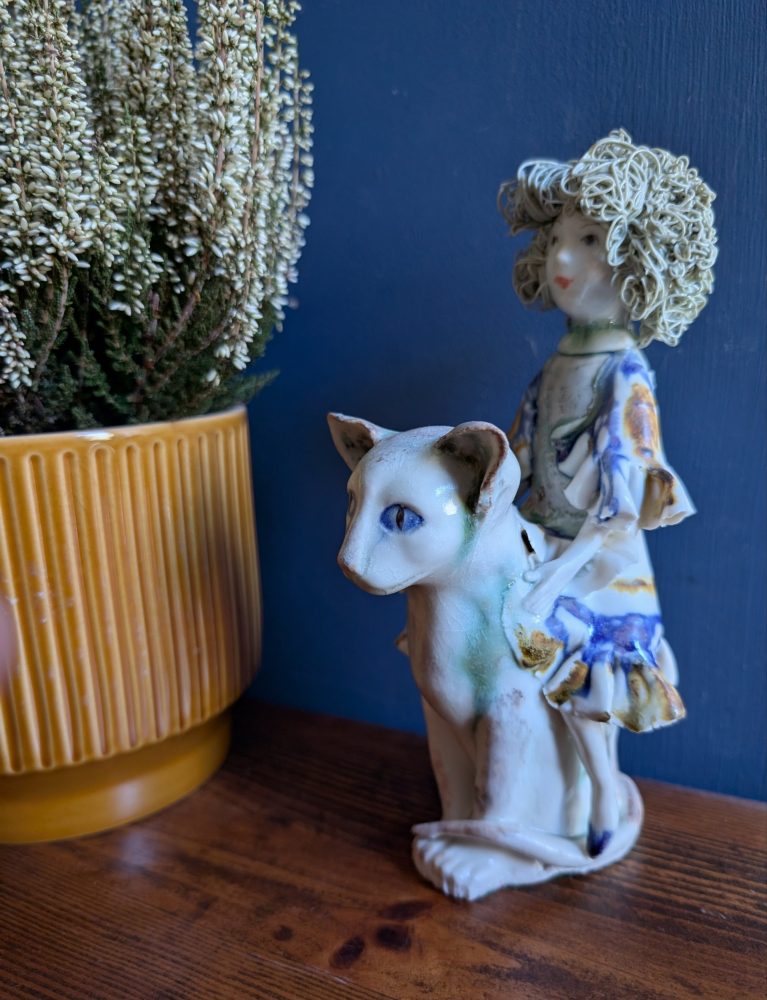 Porcelain figurine of woman riding a giant cat by Gillian Still b.1939 ...